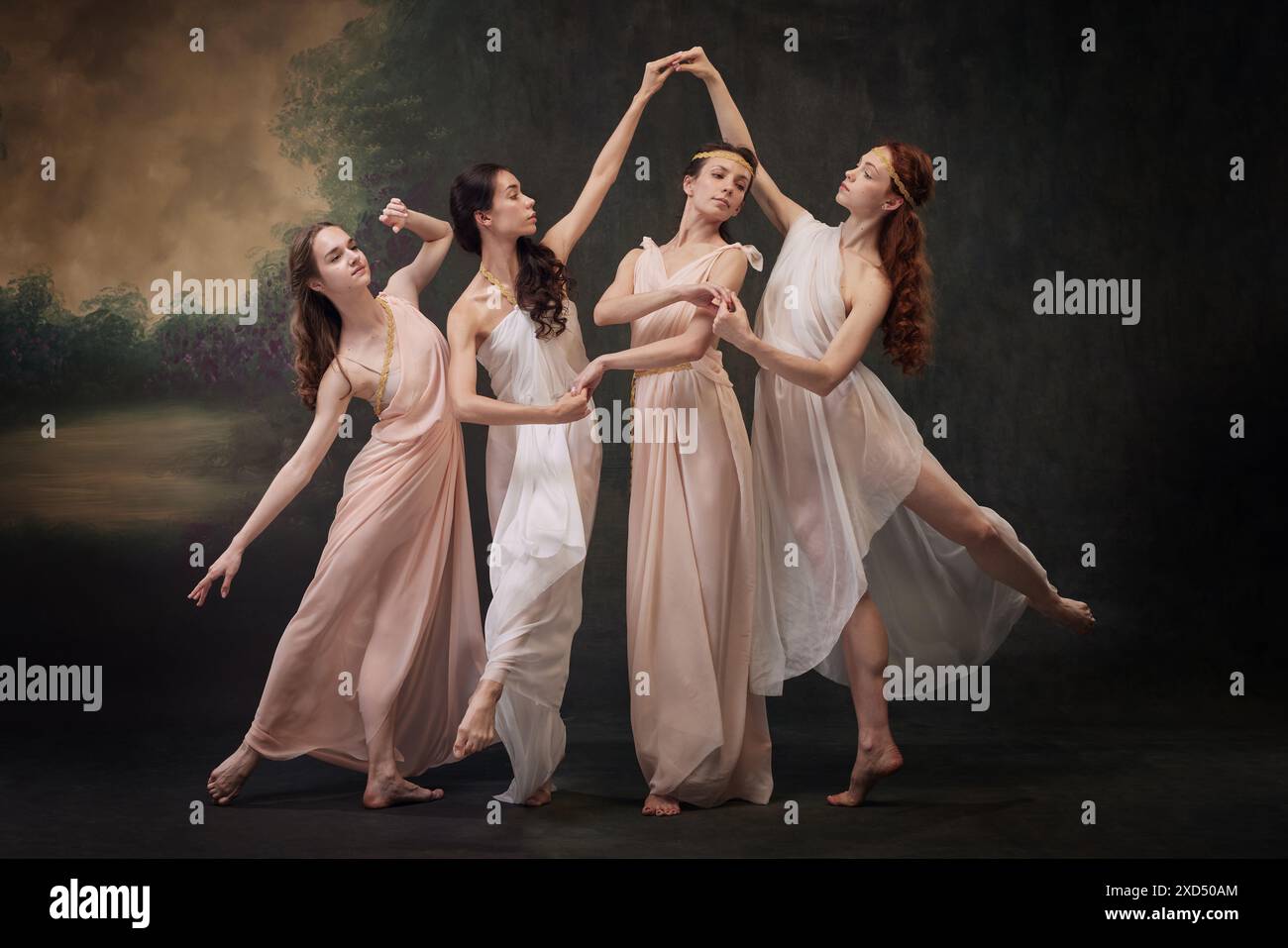 Poetic Movement. Group of dancers in flowing costumes evoke sense of ...