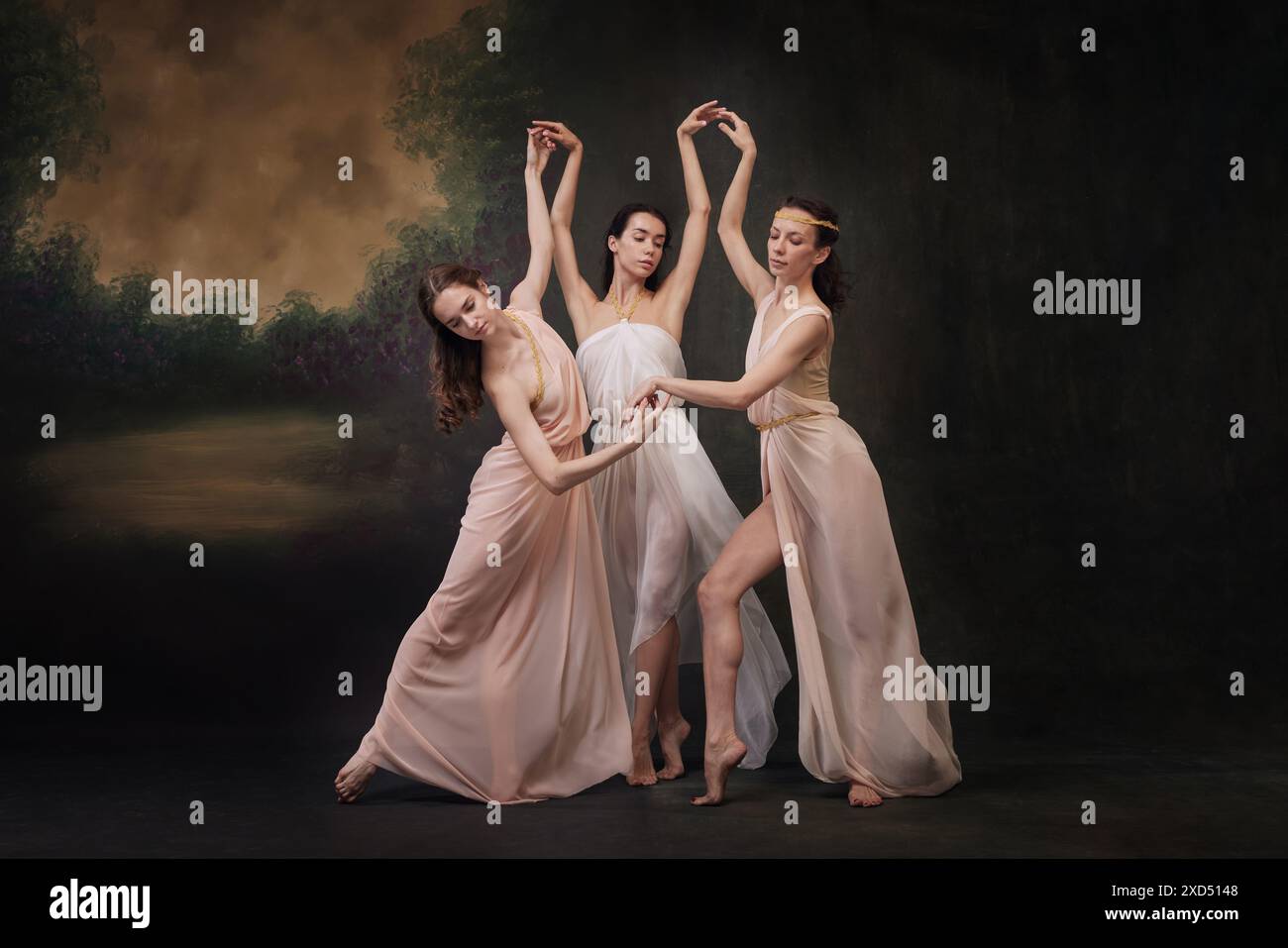 Women, muses in pastel chiffon dresses perform poetic and expressive ...