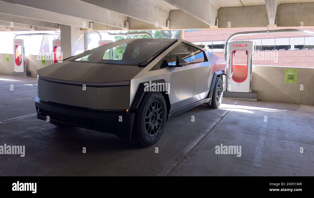 Tesla Cybertruck Charging at Supercharger Station Stock Photo - Alamy