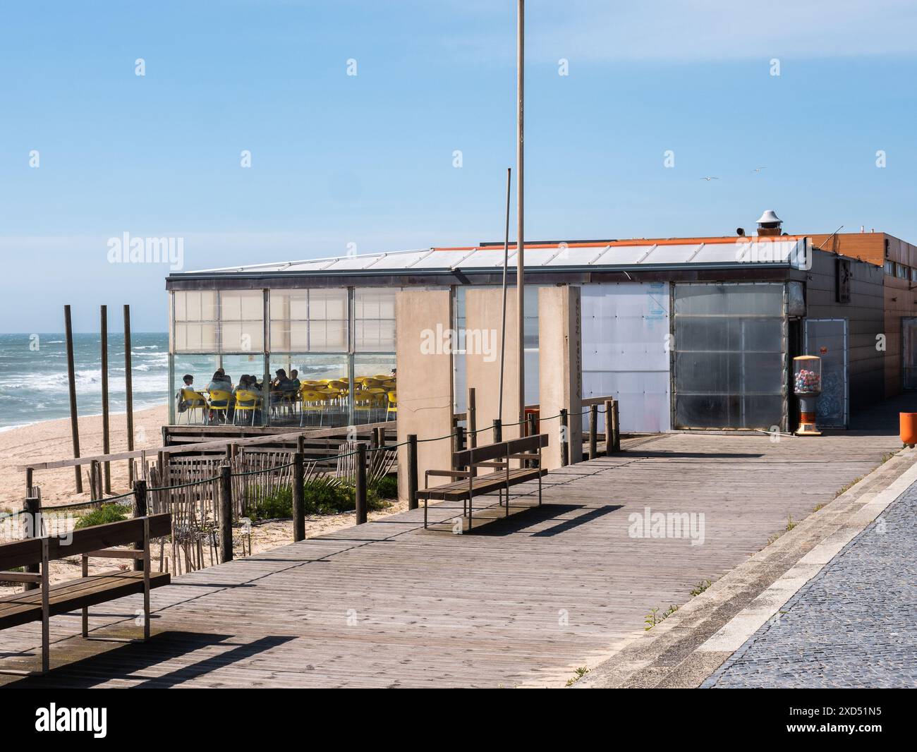 facade of outdoor cafe and restaurant with view on the atlantic ocean ...