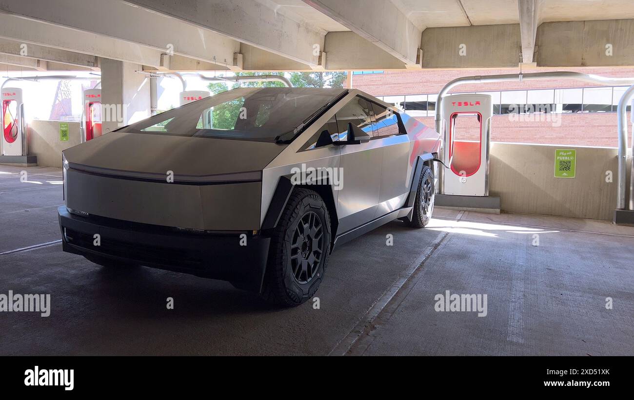 Tesla Cybertruck Charging at Supercharger Station Stock Photo - Alamy