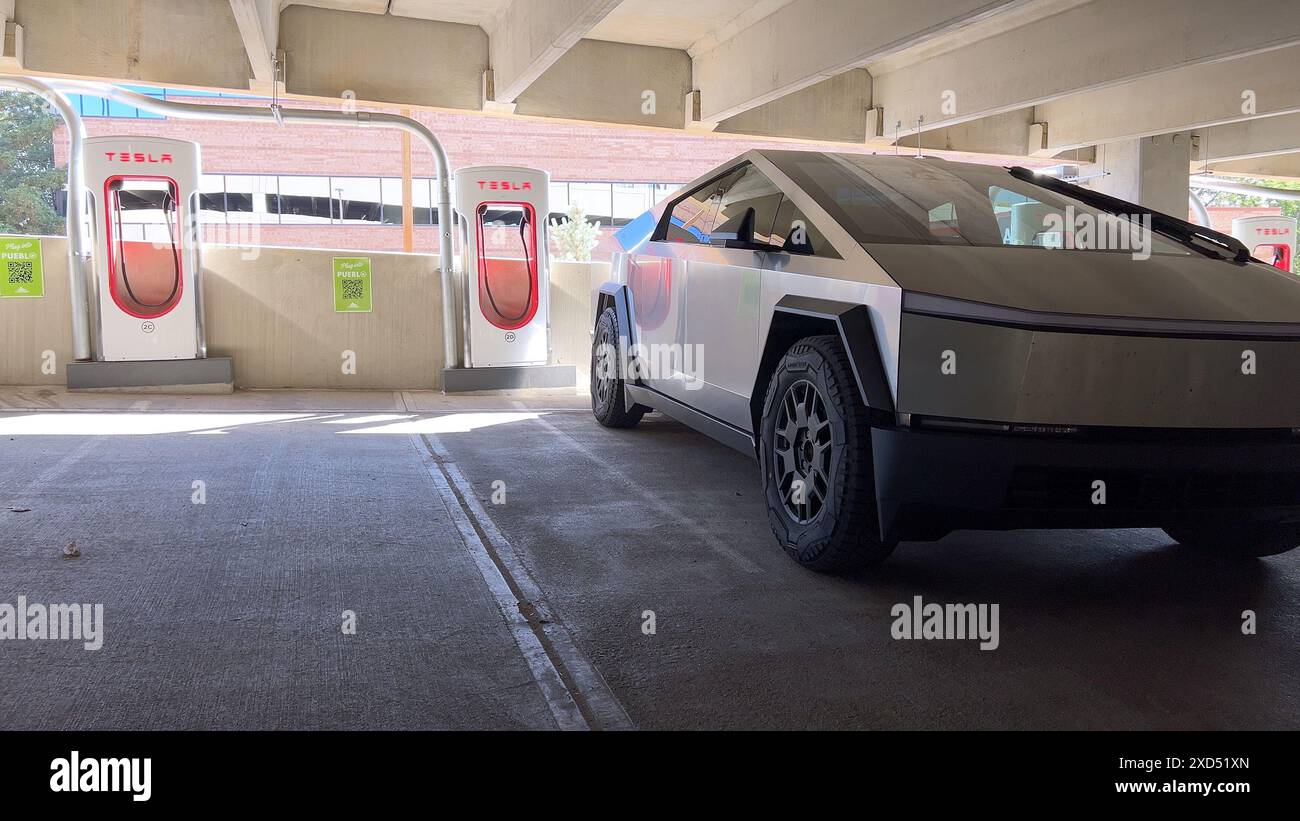 Tesla Cybertruck Charging at Supercharger Station Stock Photo - Alamy
