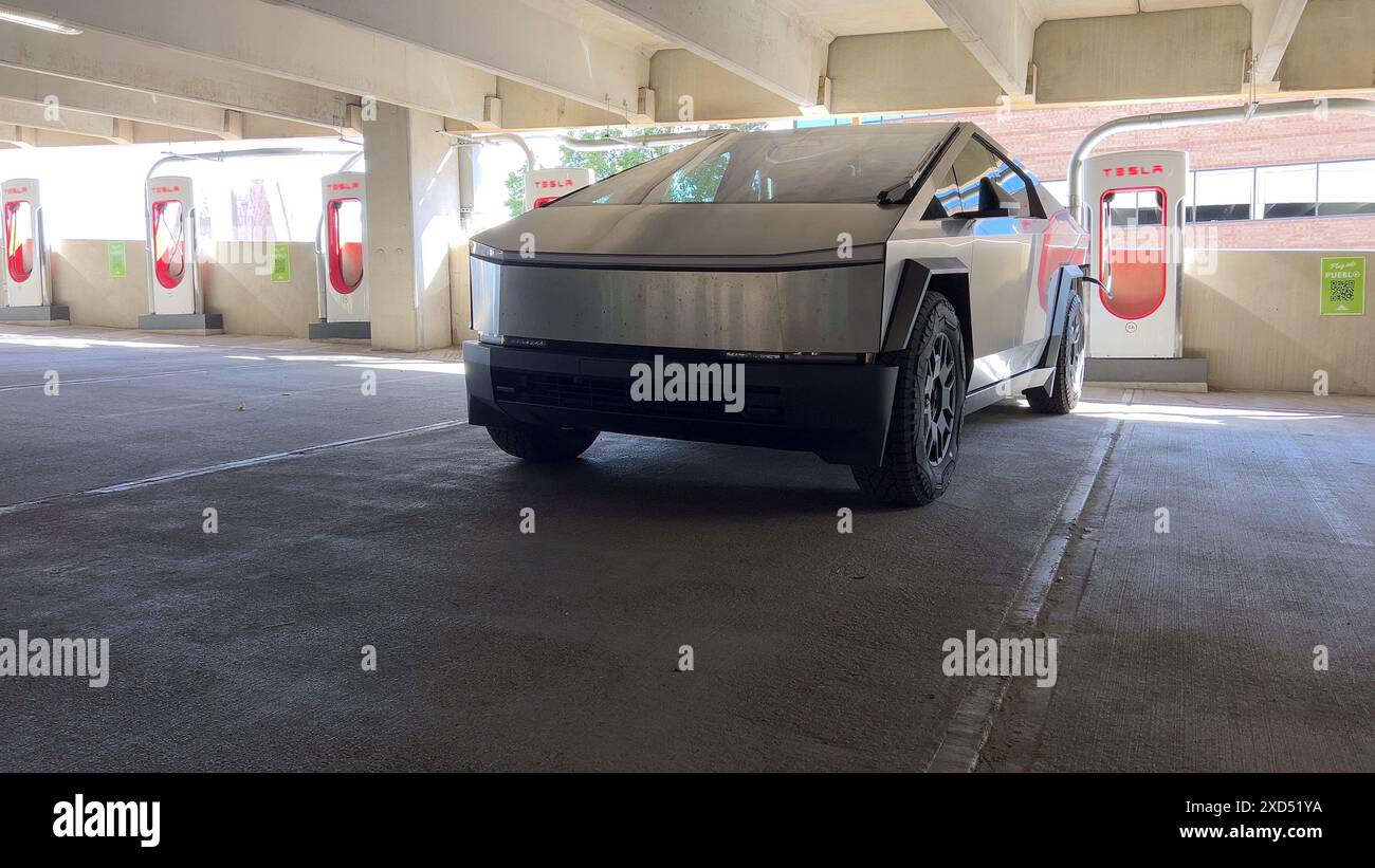 Tesla Cybertruck Charging at Supercharger Station Stock Photo - Alamy