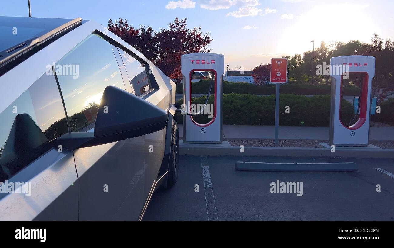 Tesla Cybertruck Charging at Outdoor Supercharger Station Stock Photo ...
