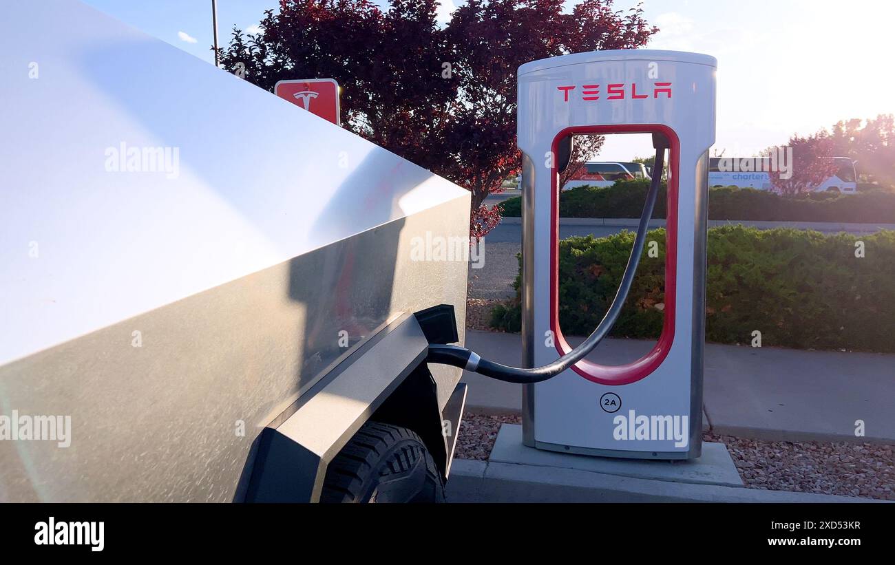 Tesla Cybertruck Charging at Outdoor Supercharger Station Stock Photo ...