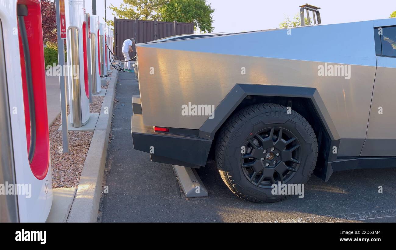 Tesla Cybertruck Charging at Outdoor Supercharger Station Stock Photo ...