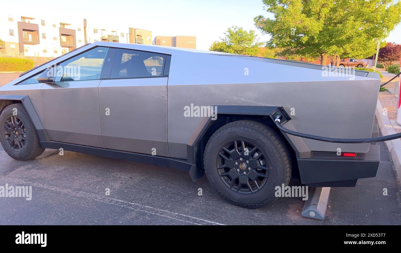 Tesla Cybertruck Charging at Outdoor Supercharger Station Stock Photo ...
