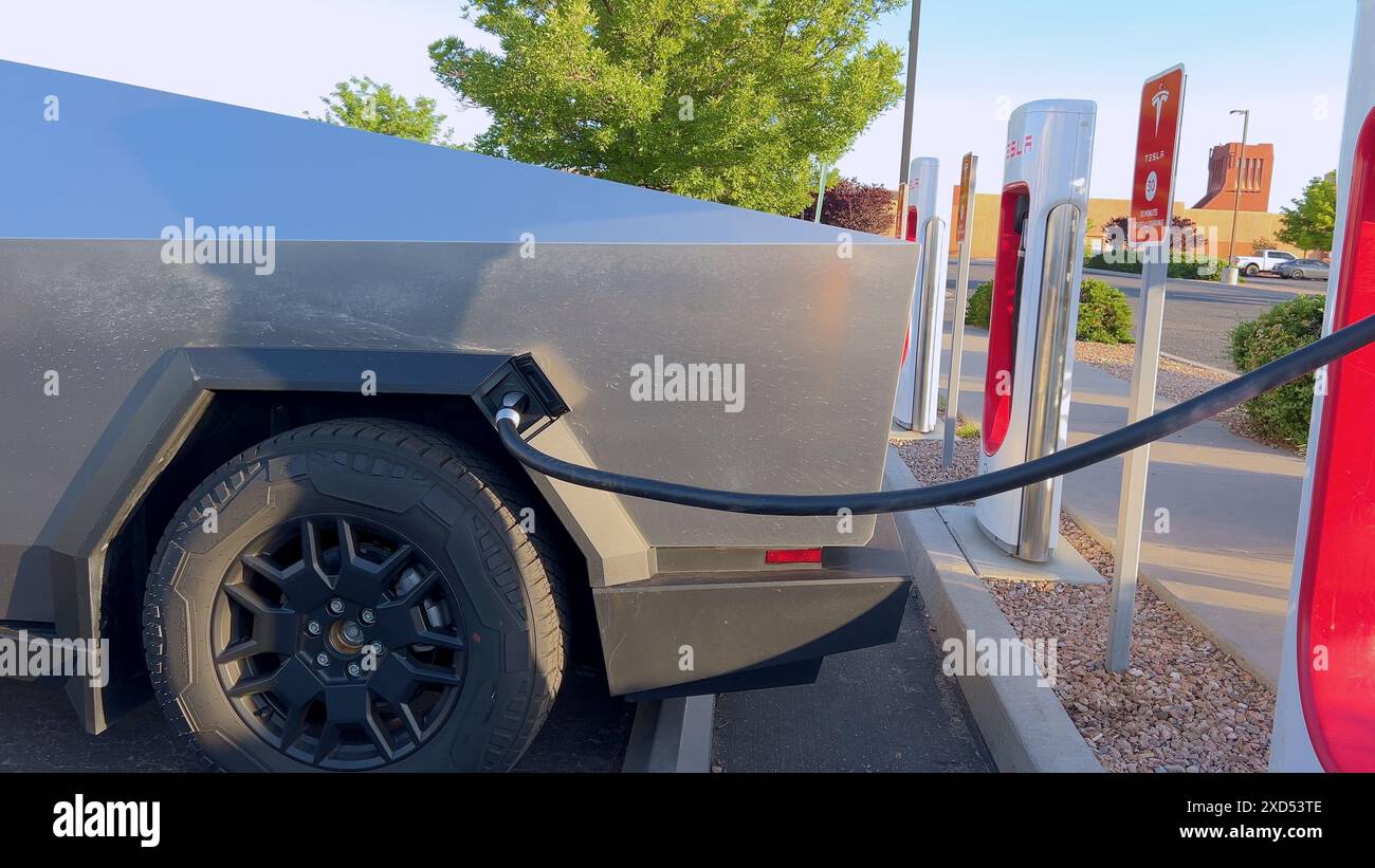 Tesla Cybertruck Charging at Outdoor Supercharger Station Stock Photo ...