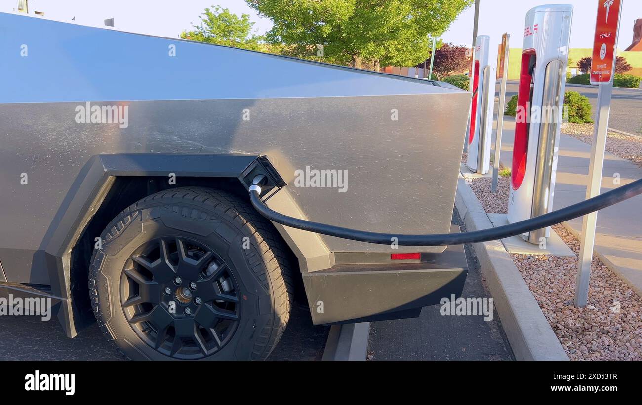 Tesla Cybertruck Charging at Outdoor Supercharger Station Stock Photo ...