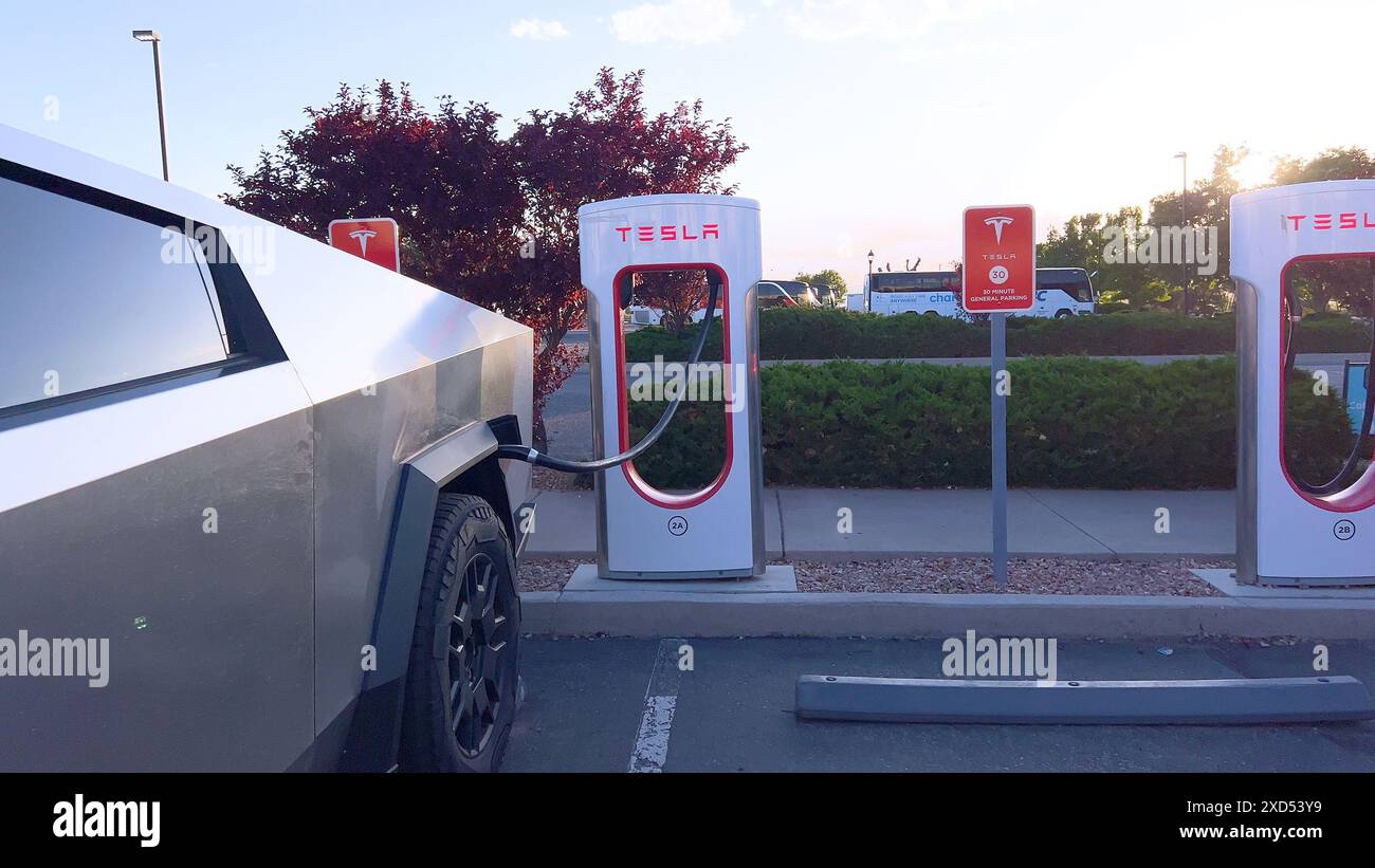 Tesla Cybertruck Charging at Outdoor Supercharger Station Stock Photo ...