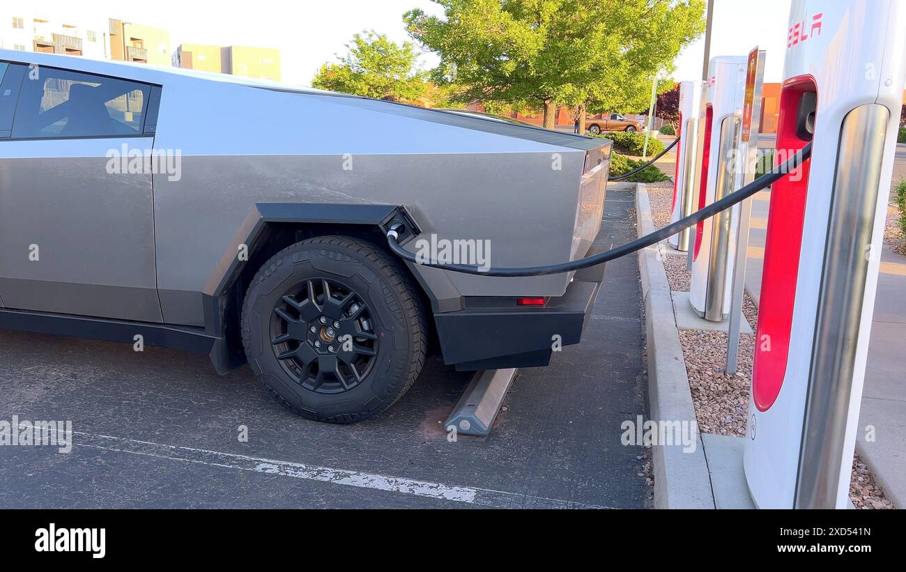 Tesla Cybertruck Charging at Outdoor Supercharger Station Stock Photo ...