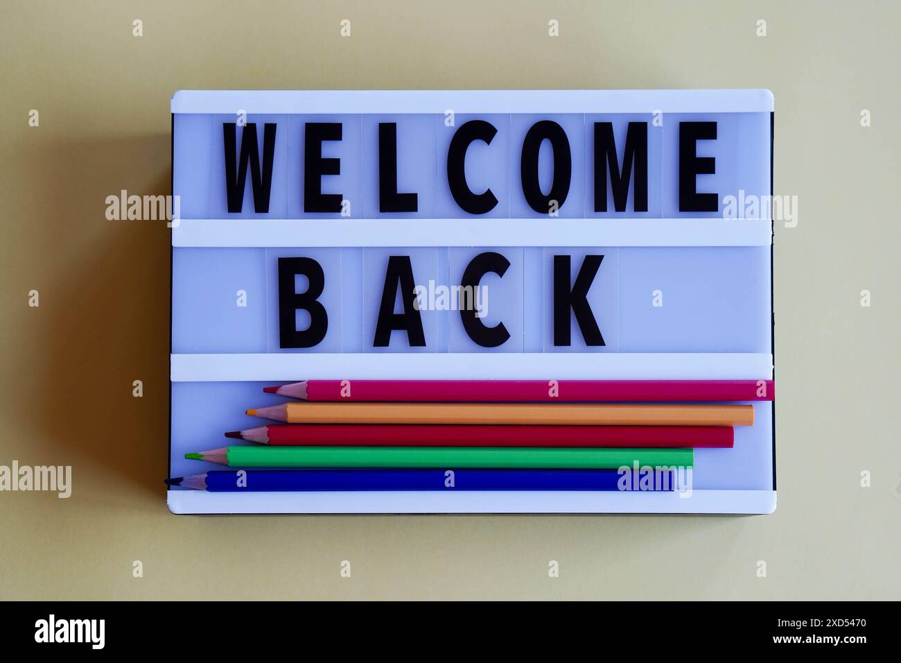 light box with words WELCOME BACK and colored pencils Stock Photo - Alamy