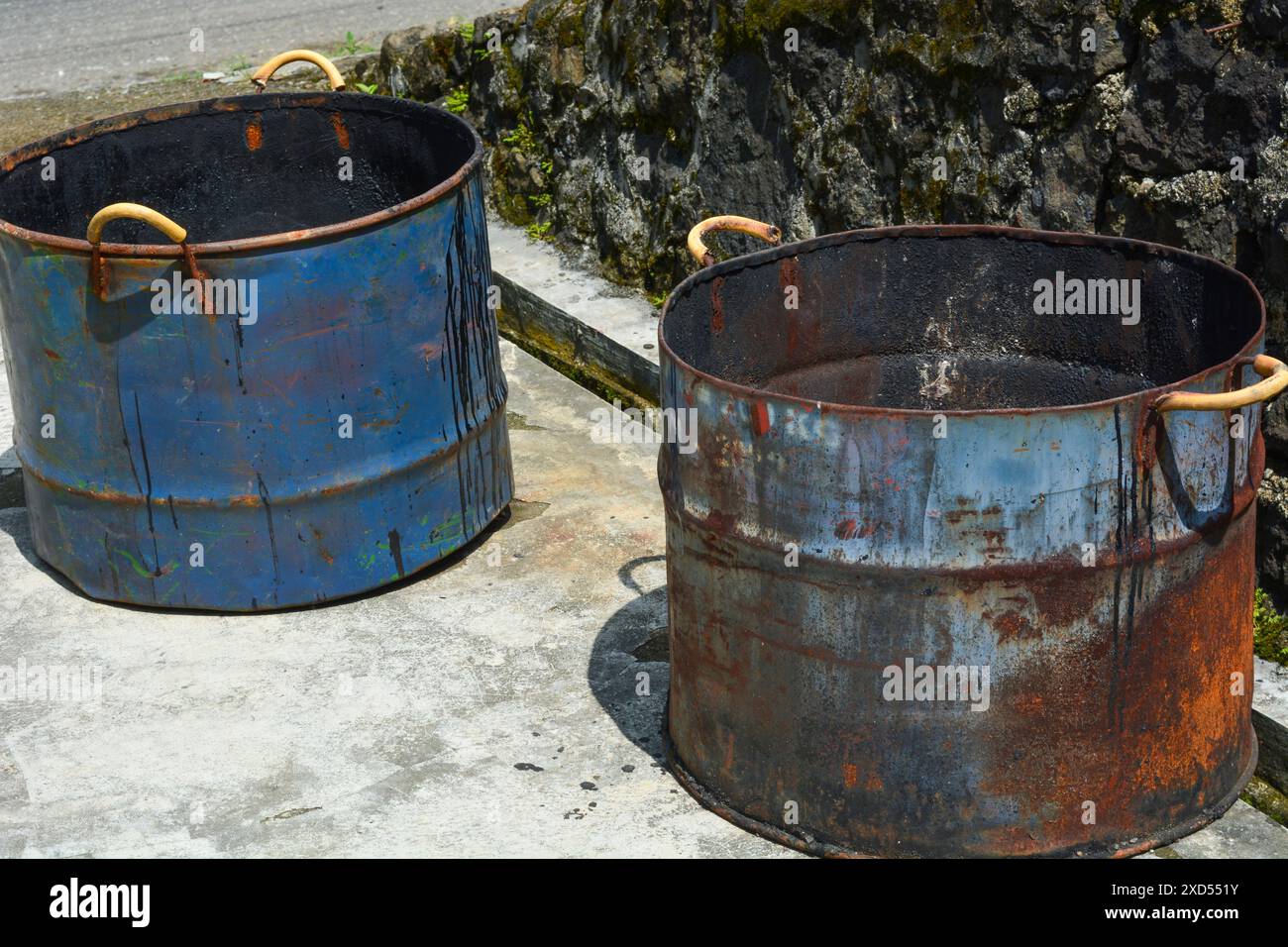 Photo of two trash cans made from used cans Stock Photo - Alamy