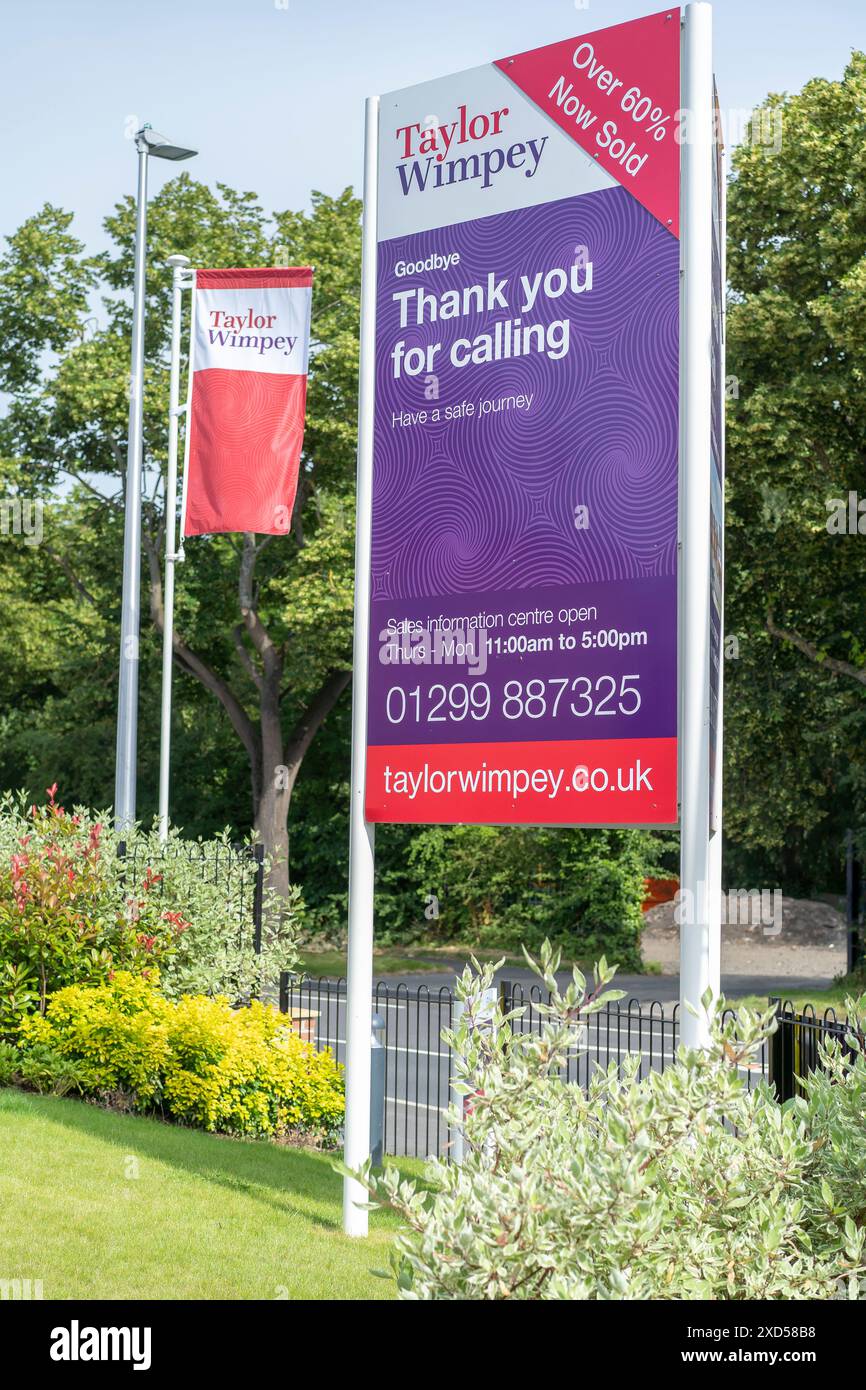 Taylor Wimpey Homes sign board Stock Photo - Alamy
