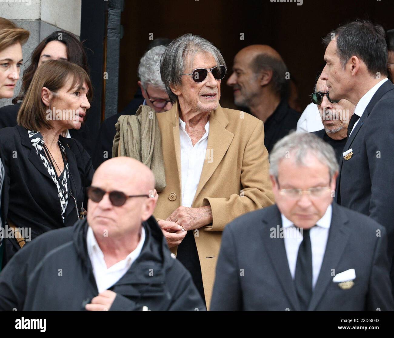 Sylvie Duval and Jacques Dutronc leaving the funeral ceremony for ...