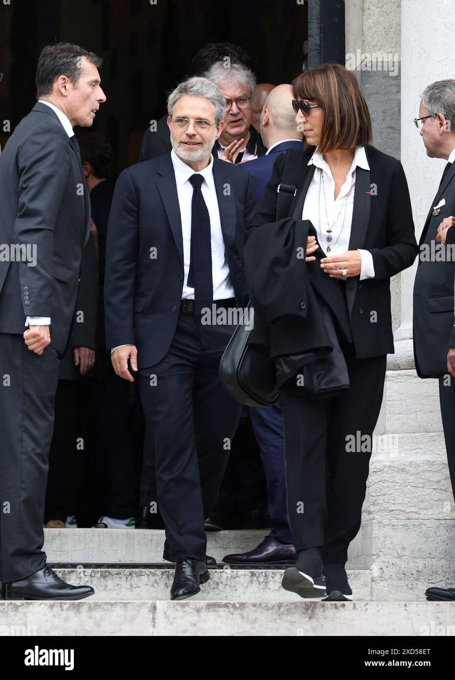 Paris, France. 20th June, 2024. Guest leaving the funeral ceremony for ...