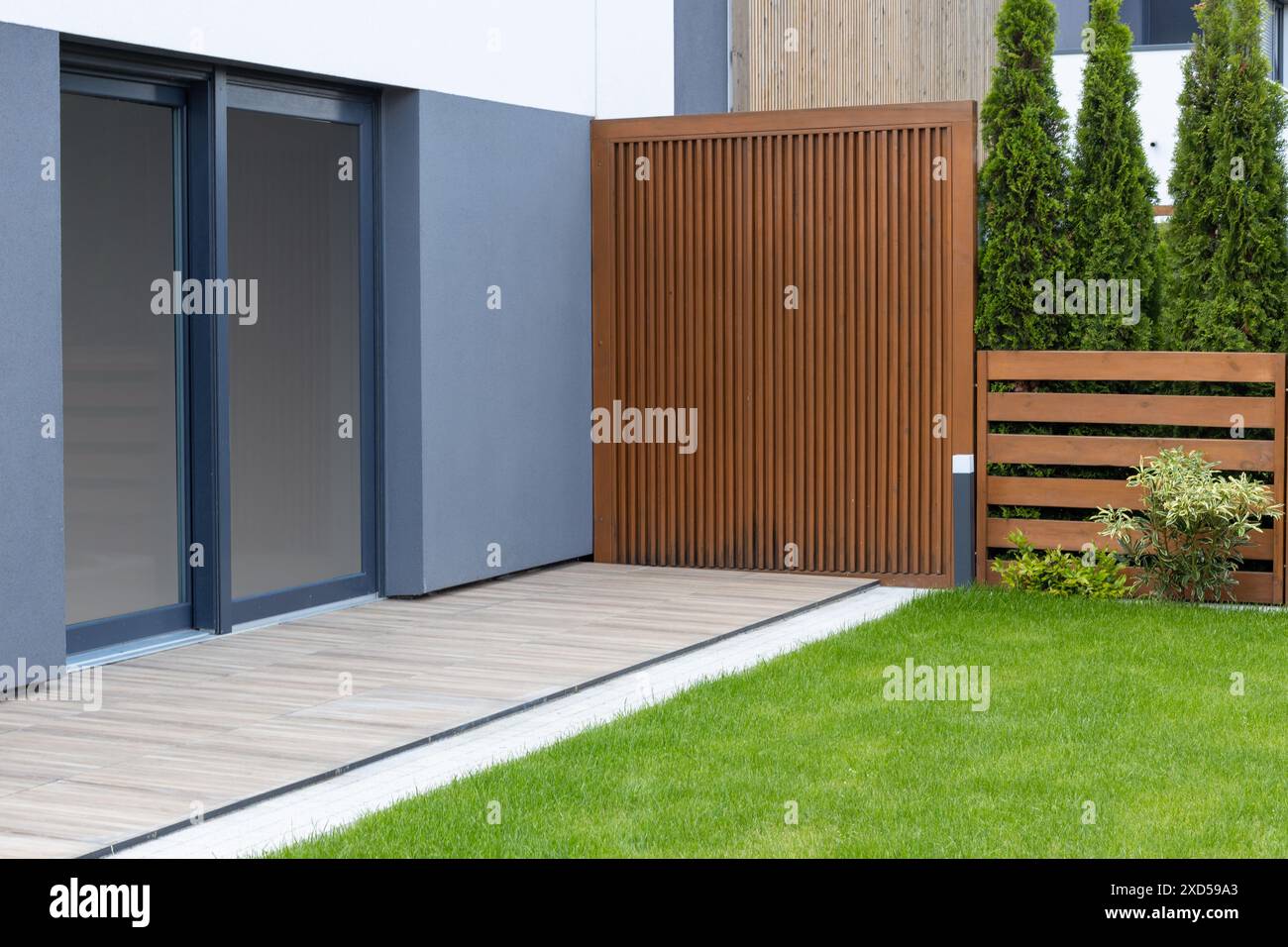 Outdoor Patio with Wooden Decking Stock Photo - Alamy