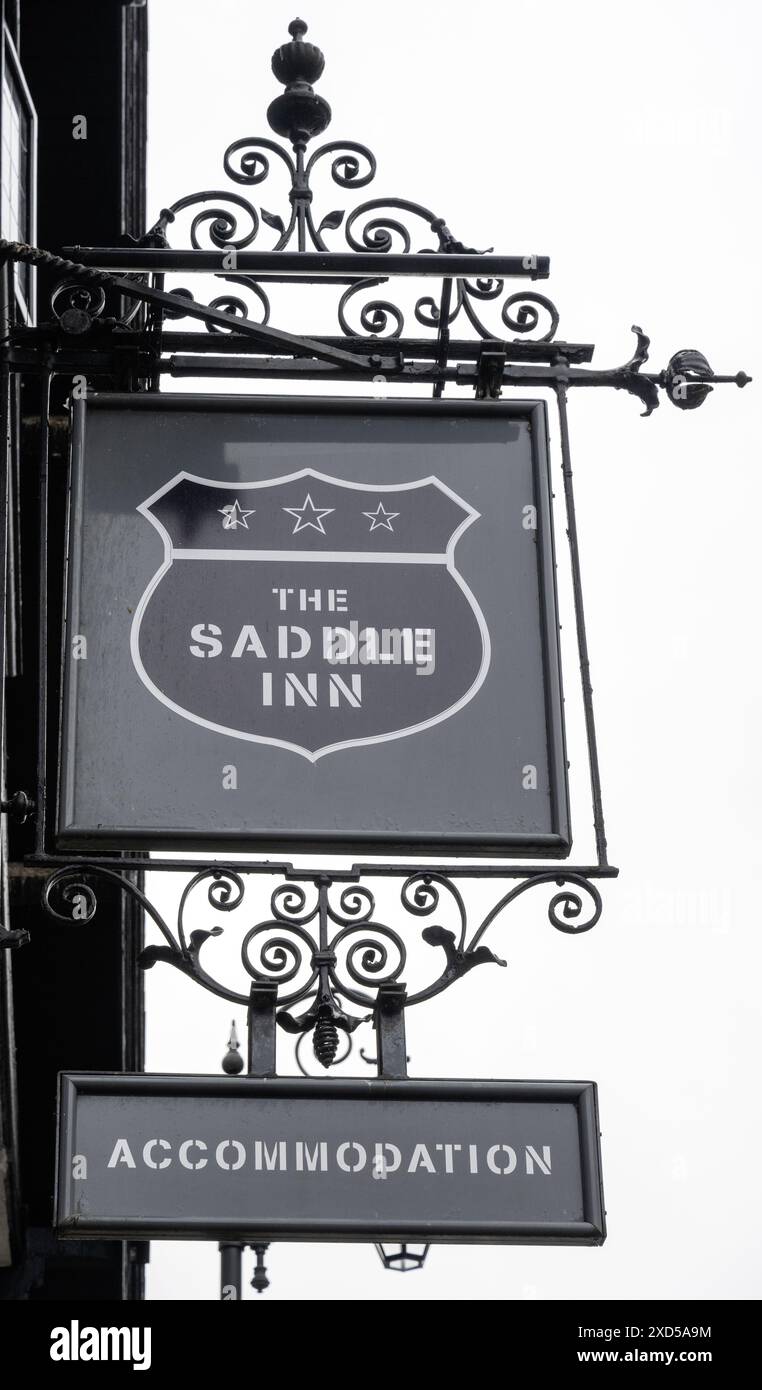 Traditional hanging pub sign at The Saddle Inn, Grosvenor Street ...