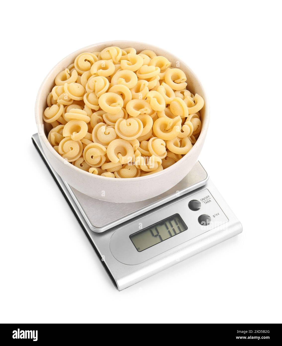 Kitchen scale with bowl of pasta isolated on white Stock Photo - Alamy