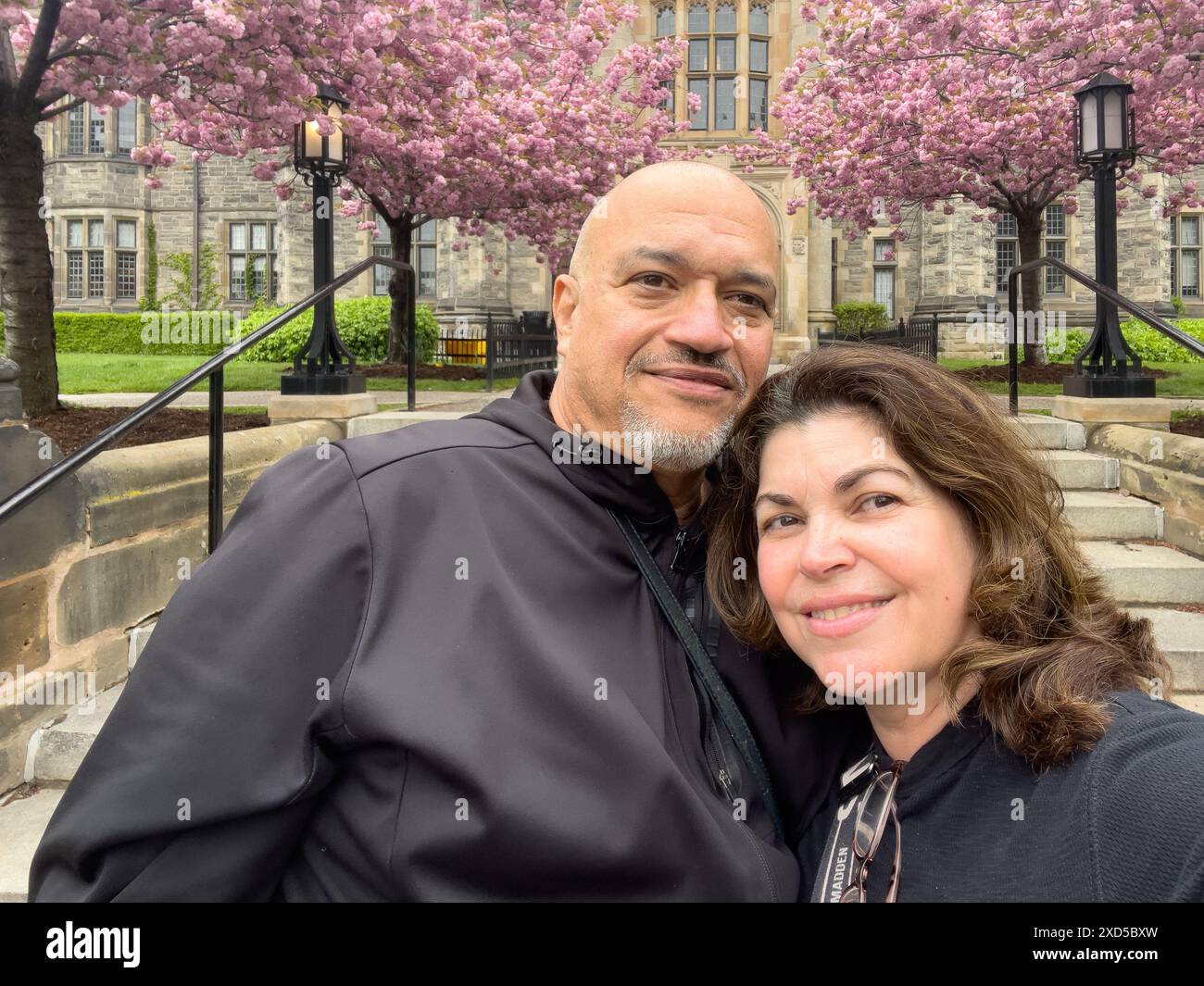 Selfie portrait of the couple by cherry trees in bloom, Toronto, Canada ...