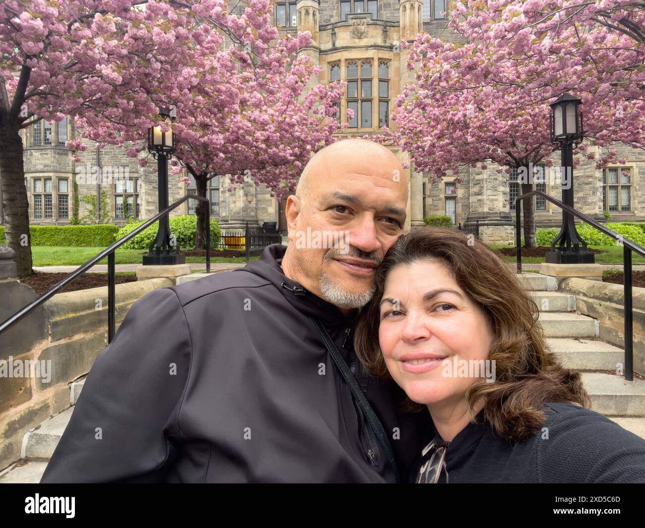 Selfie portrait of the couple by cherry trees in bloom, Toronto, Canada ...