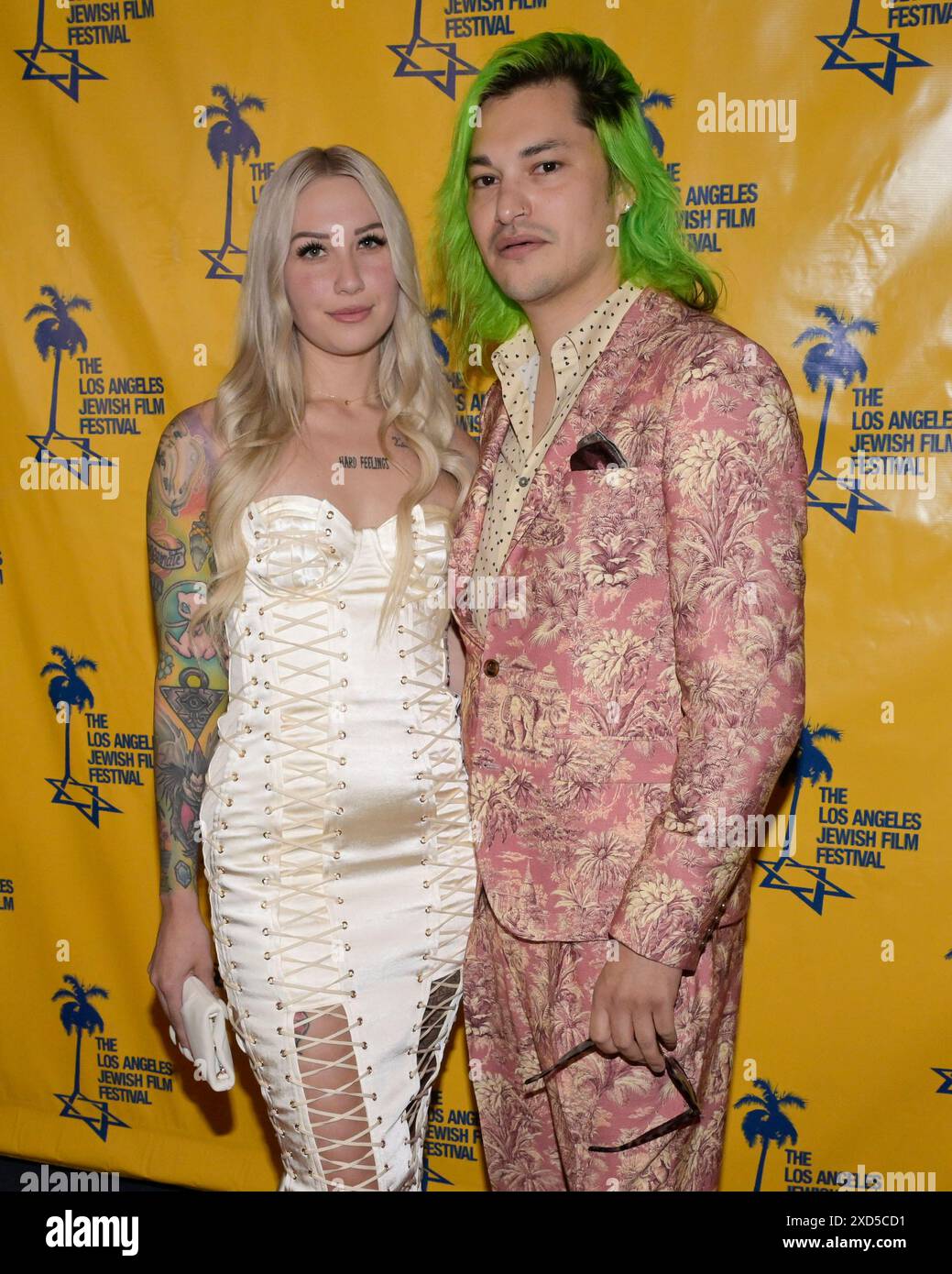 June 19, 2024, Beverly Hills, California, USA: Ashley Atwell and Zach ...