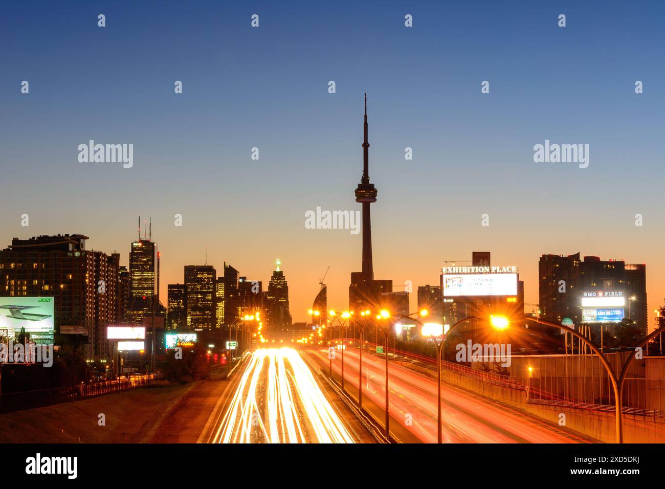 Toronto cityscape by the Gardiner Expressway during dawn hours, Ontario ...