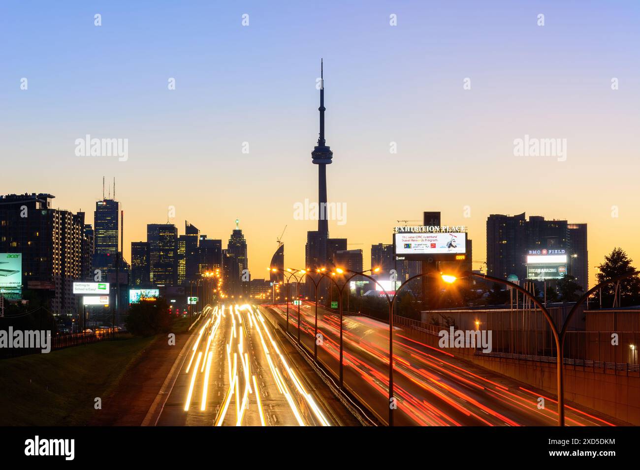 Toronto cityscape by the Gardiner Expressway during dawn hours, Ontario ...