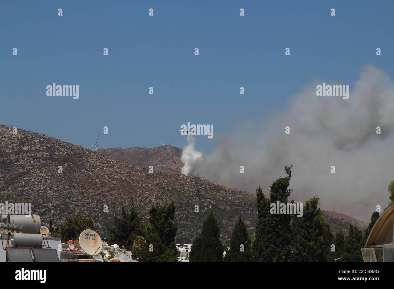 Bodrum,Turkey. july 27, 2017: Firefighting aircraft drops water during ...