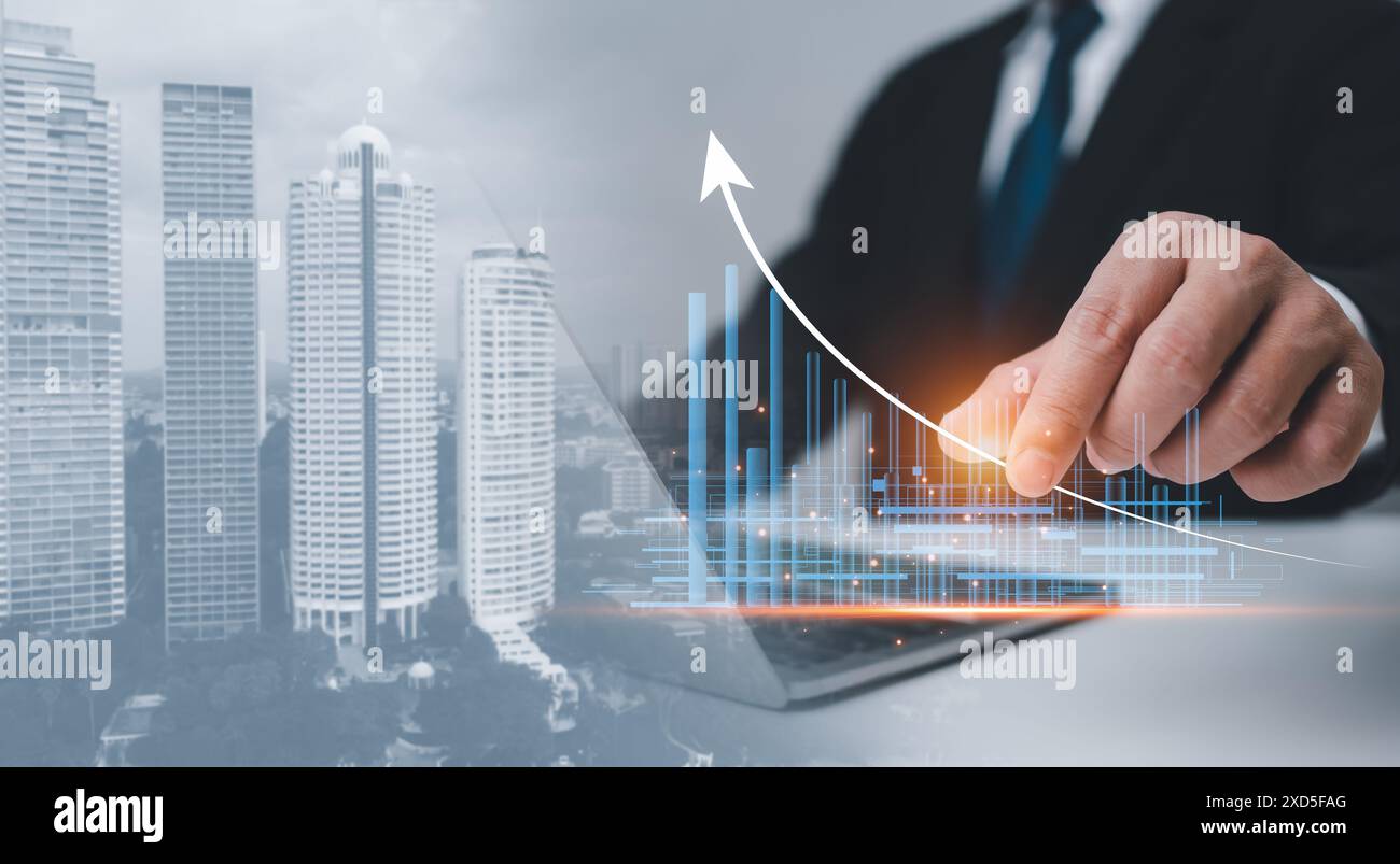 Businessman holding growing chart hi-res stock photography and images ...