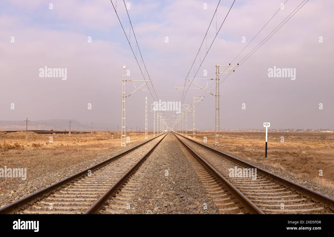 Railroad tracks going beyond the horizon Stock Photo - Alamy