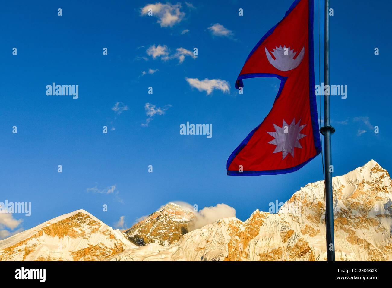 Nepalese flag wave by Kala Pathhar viewpoint.Sagarmatha national park ...