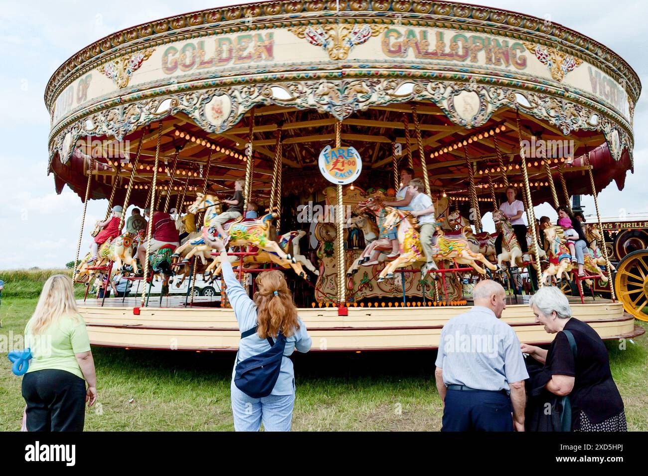 A Frederick Savage steam driven galloping horses carousel at a country ...