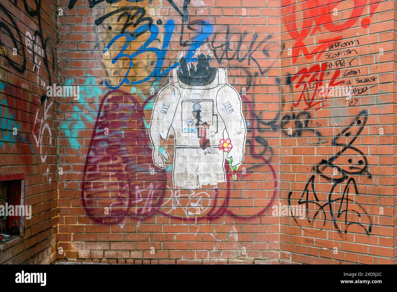 Astronaut graffiti paste up by street artist Pall3y, Springfield Court ...