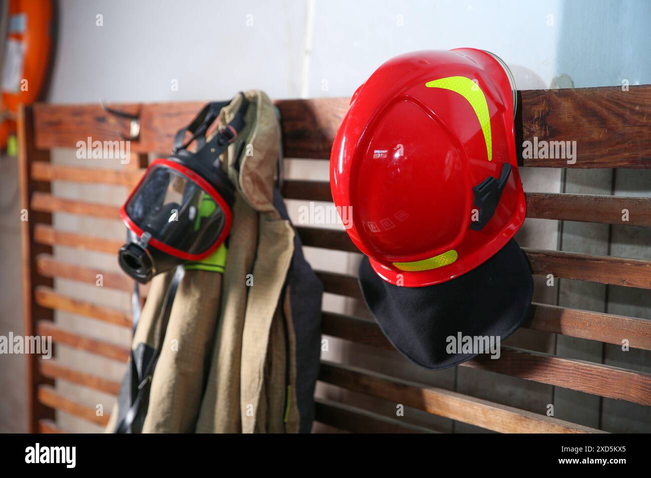 Firefighter`s uniform, helmet and mask at station Stock Photo - Alamy