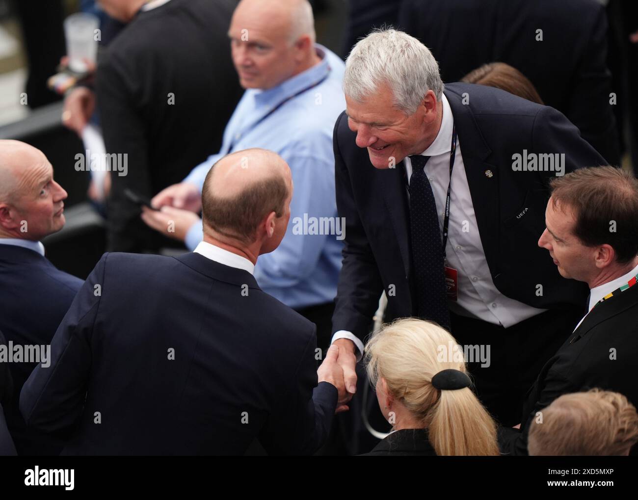 The Prince of Wales (left) greets David Gill in the stands before the ...