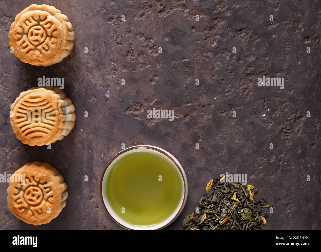 traditional mooncakes and green tea on the table Stock Photo - Alamy