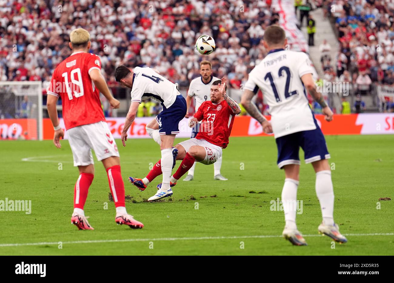 Denmark's Pierre-Emile Hojbjerg slips into a tackle on England's Declan ...