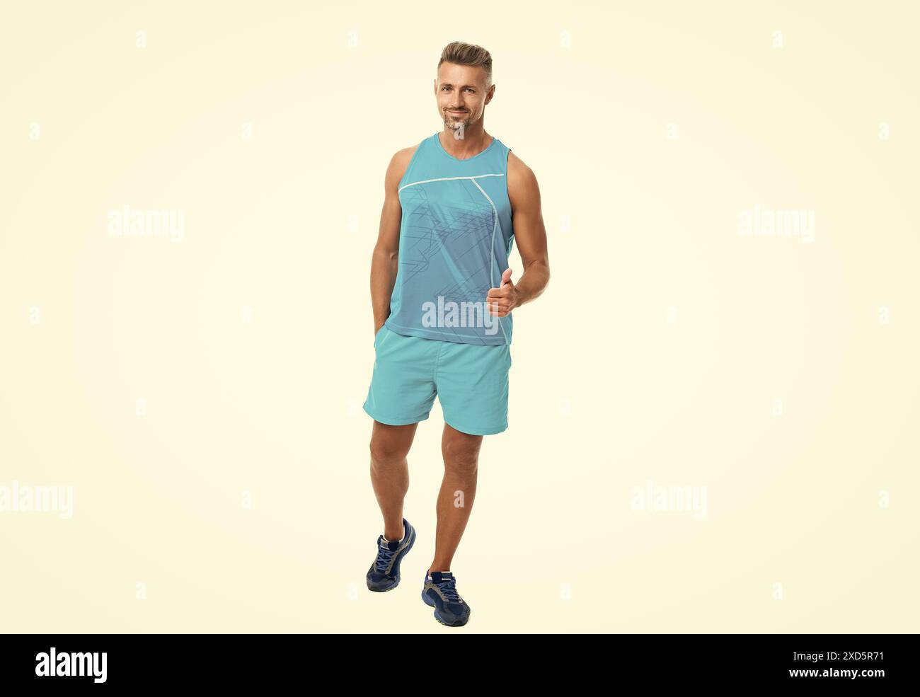 The male sport athlete show thumb up on studio. sport athlete with fit ...