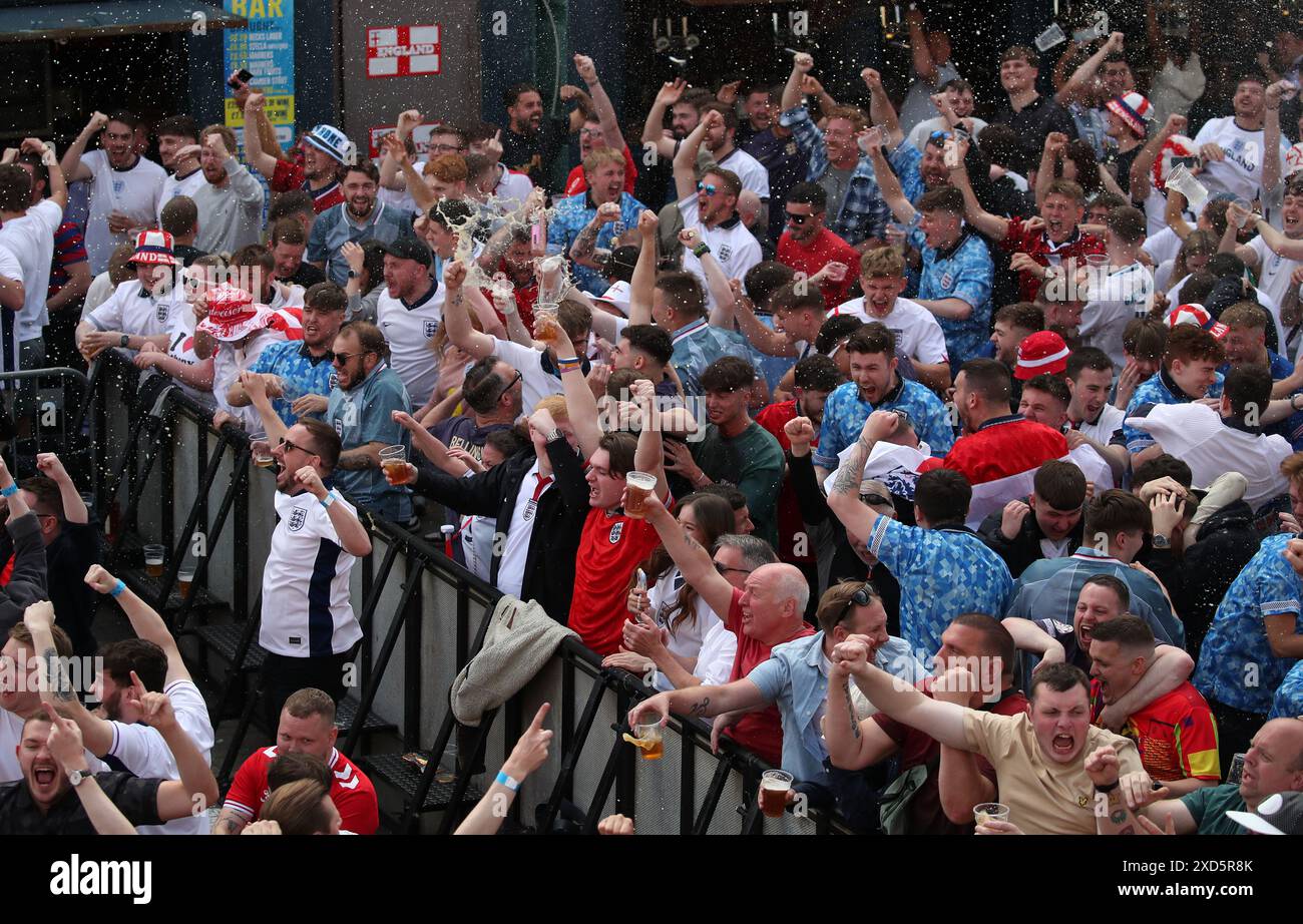 England fans celebrate their side’s first goal at the 4theFans Central ...