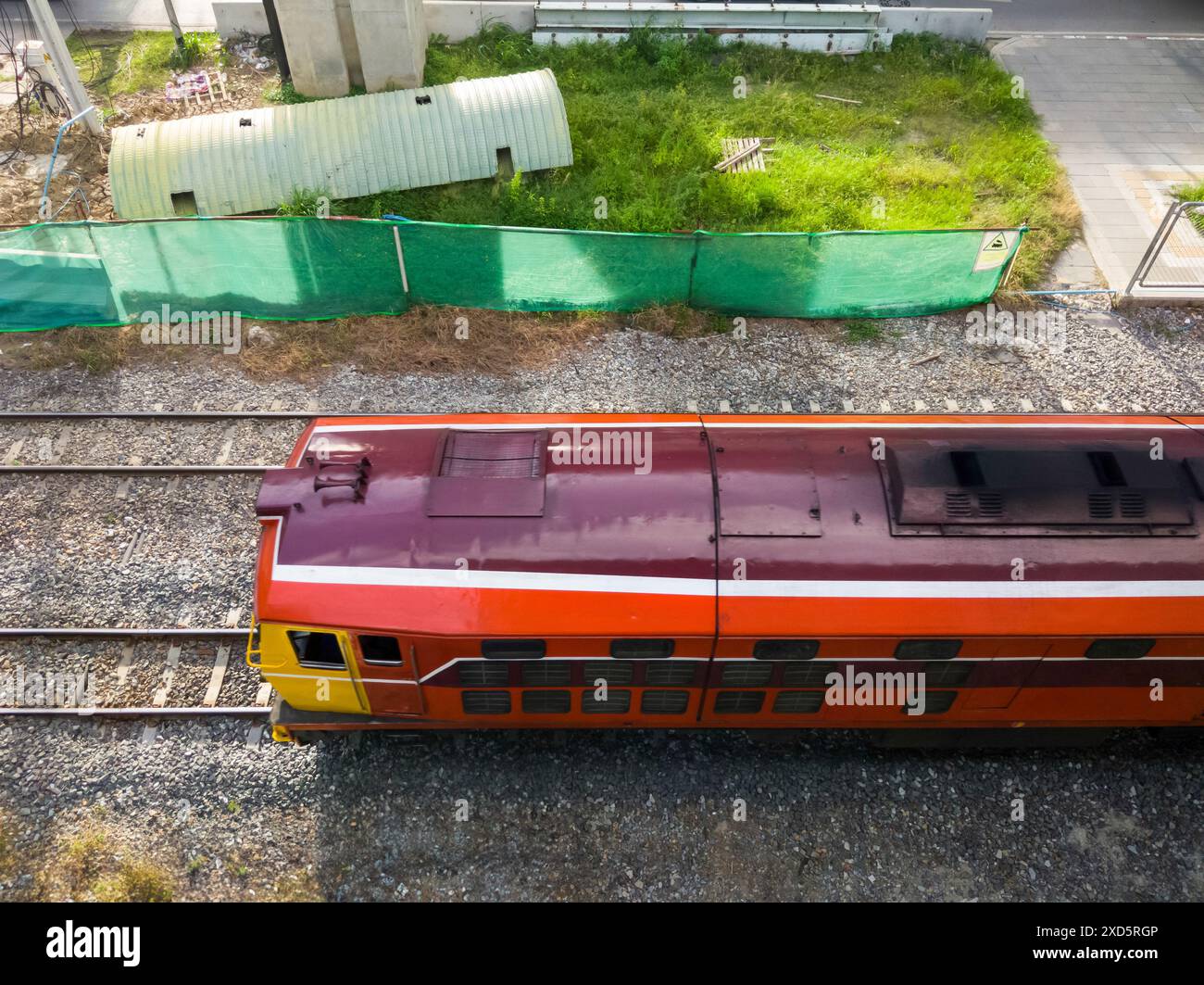 Top view of the diesel electric locomotive of a freight train passing ...
