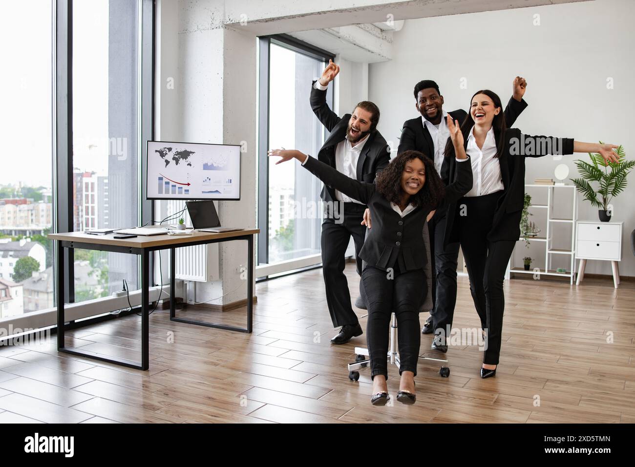 Diverse colleagues having fun in modern office setting Stock Photo - Alamy