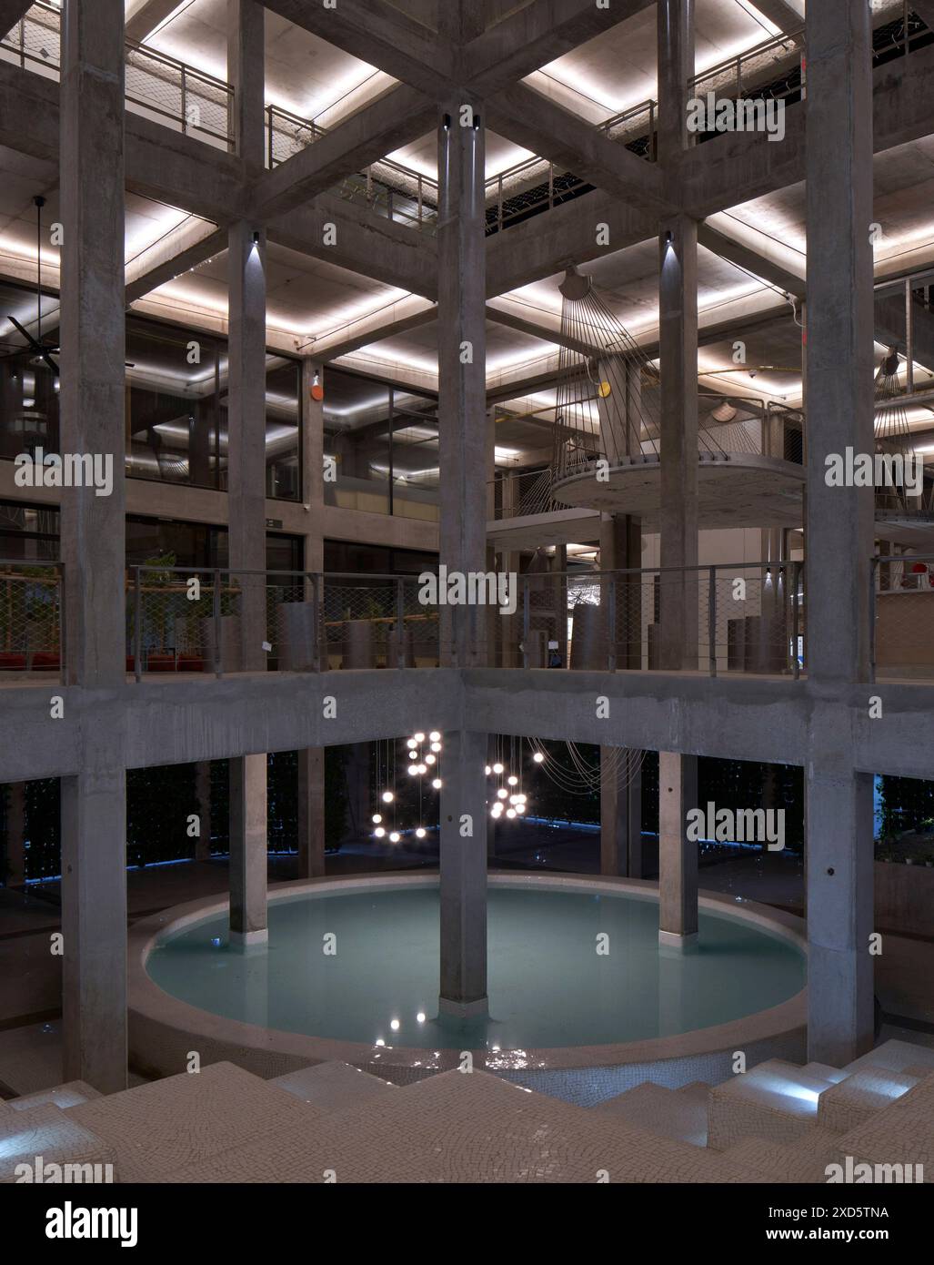 Water feature in basement, next to central courtyard. Third Space ...