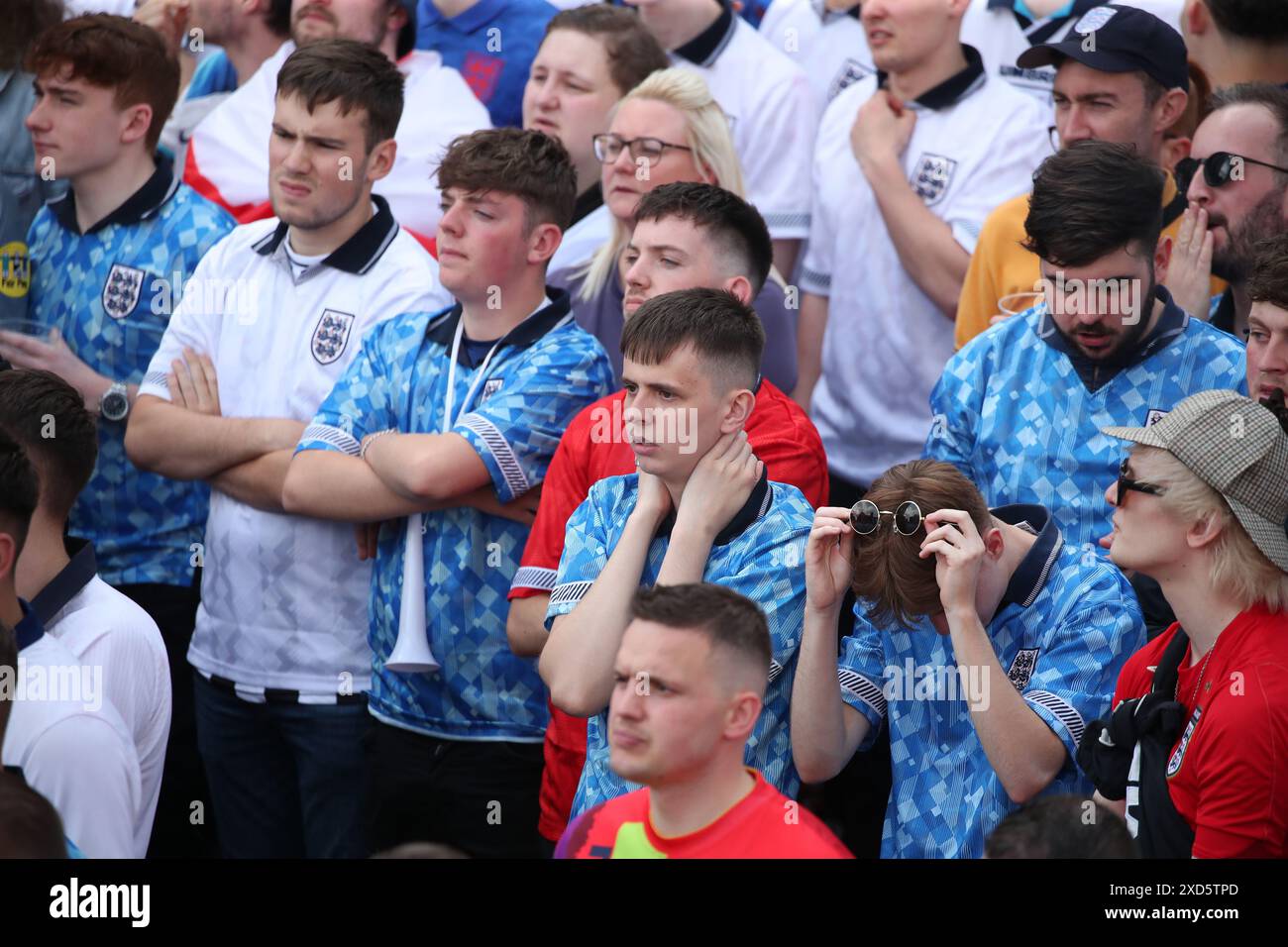 Dejected England fans at Central Park, Newcastle, watching a screening ...