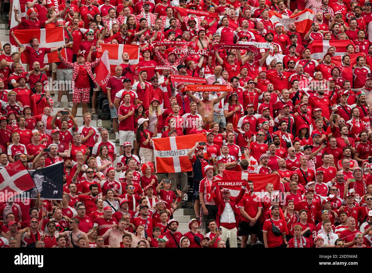 Denmark fans sing their national anthem prior to a Group C match ...