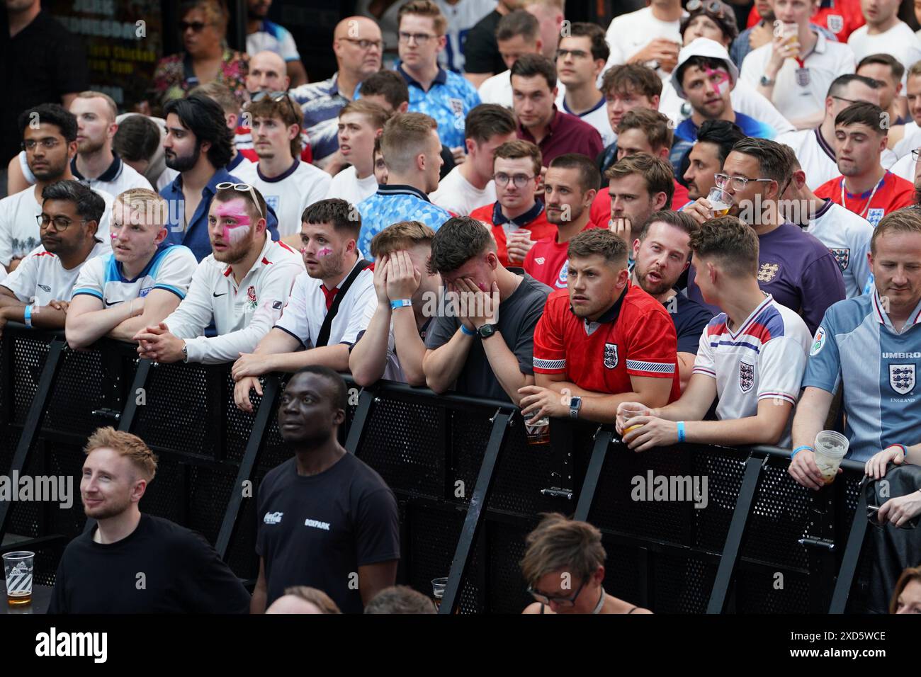 Dejected England fans at Boxpark Croydon in London, watching the UEFA ...