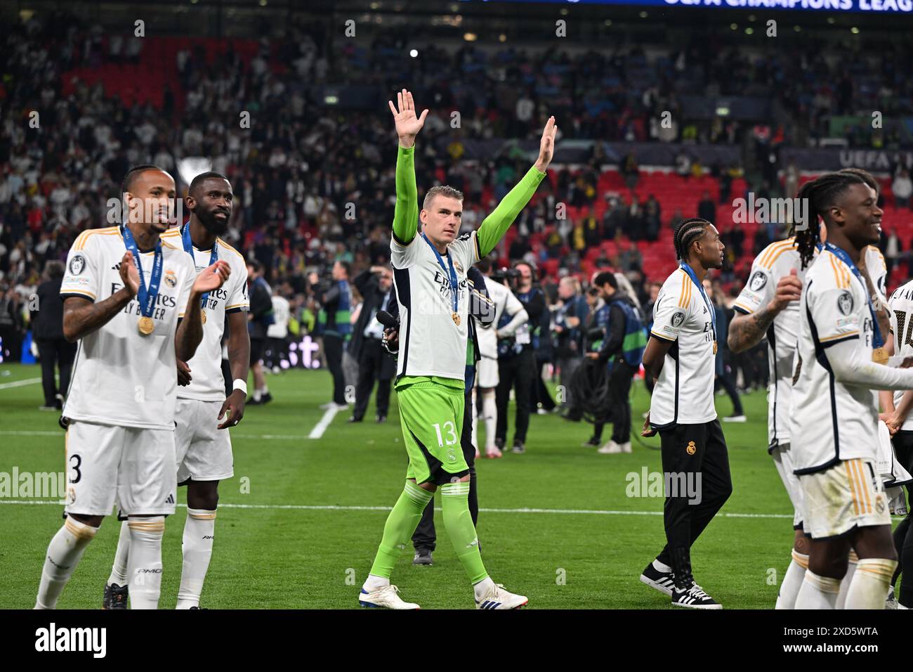 goalkeeper Andriy Lunin (13) of Real Madrid celebrates after winning a ...