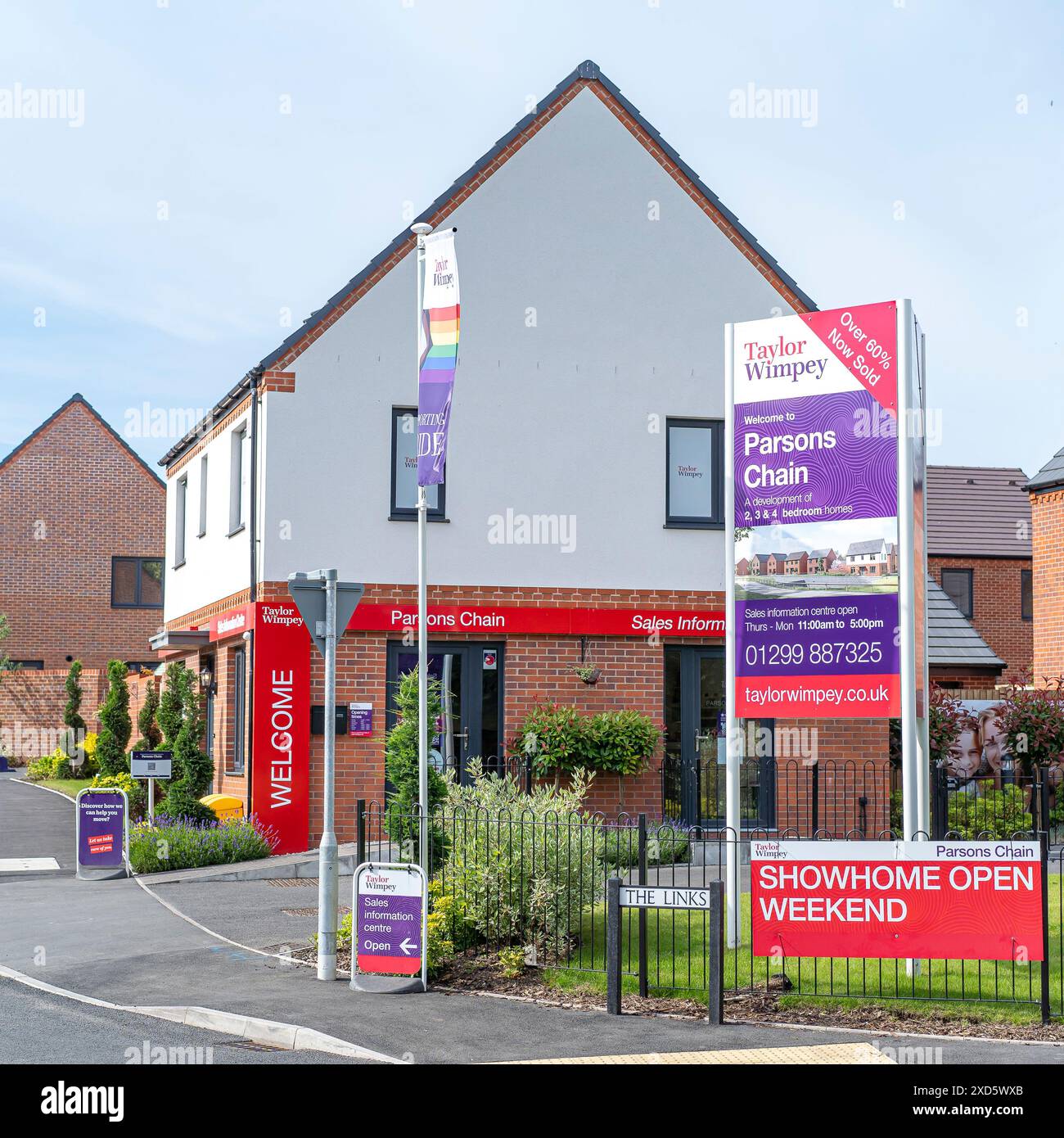 Taylor Wimpey Homes sales information sign outside sales office & show ...