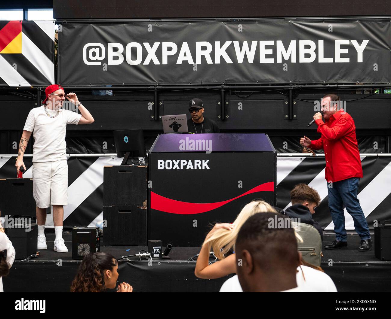 EDITORIAL USE ONLY Aitch and Shaun Williamson perform Sweet Caroline on ...