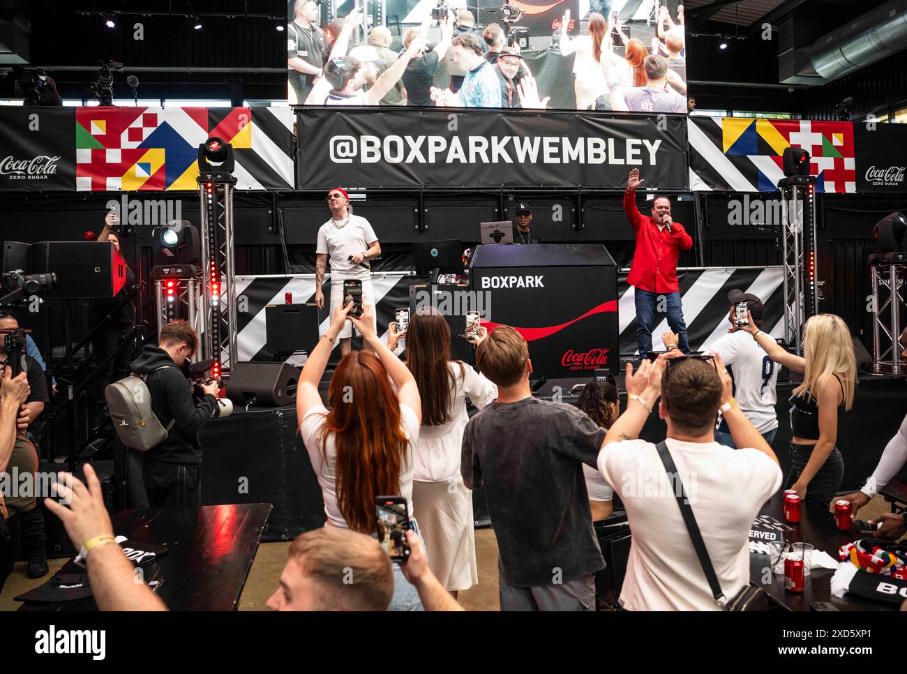 EDITORIAL USE ONLY Aitch and Shaun Williamson perform Sweet Caroline on ...